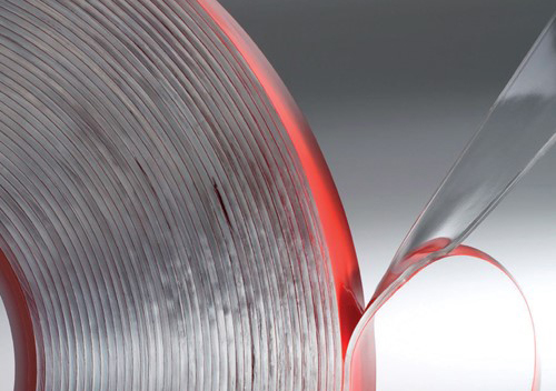 Adhesive tape converter with advanced capabilities for manufactured ...